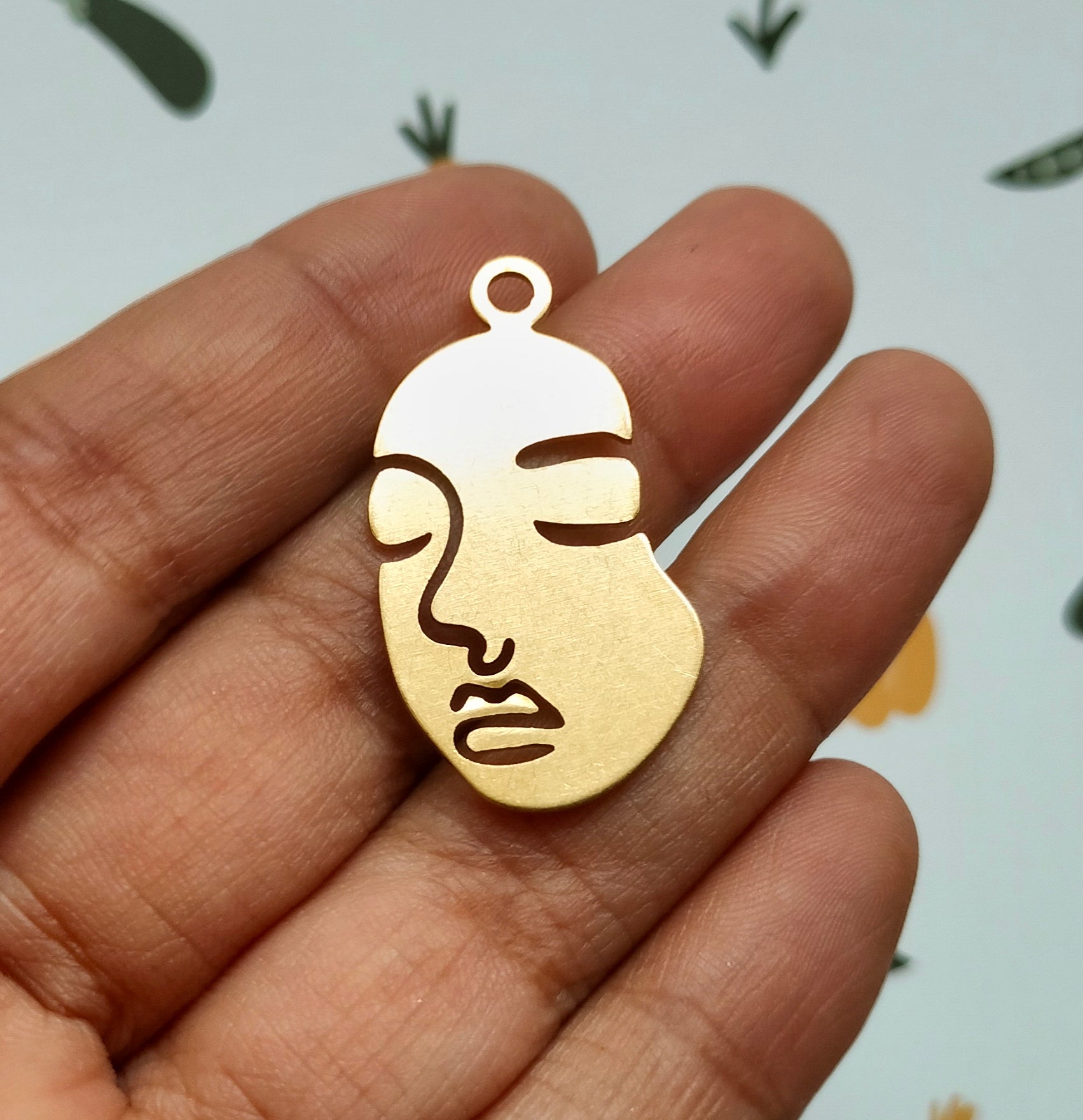 Face charm – The Crimson Store